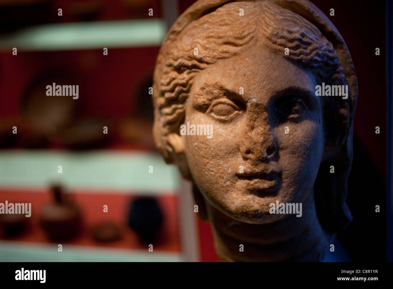 A disfigured female head from the ancient era on display in Manchester ...
