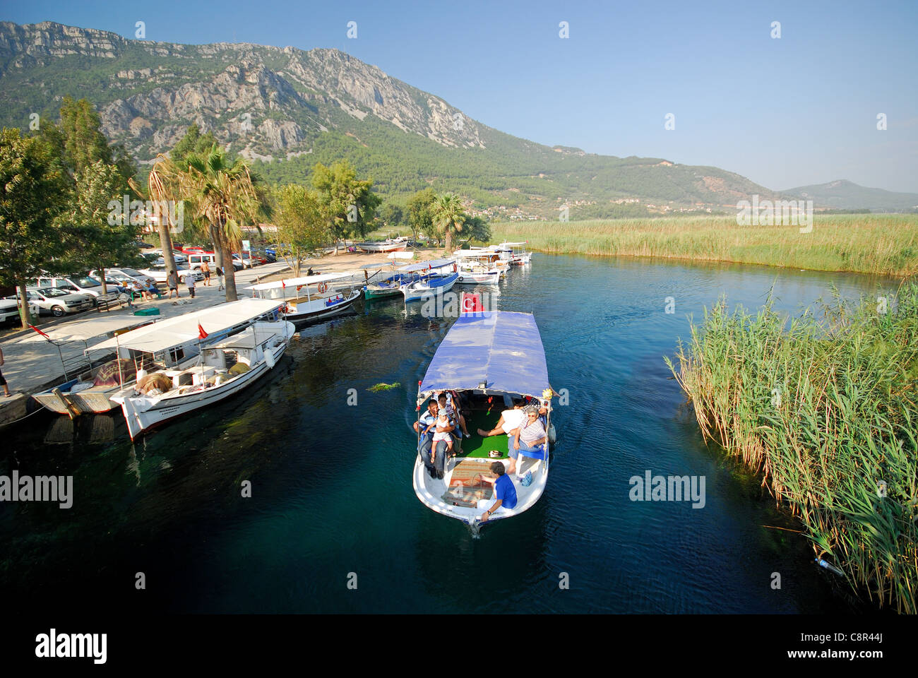 AKYAKA, TURKEY. A pleasure boat taking holidaymakers along the Azmak ...