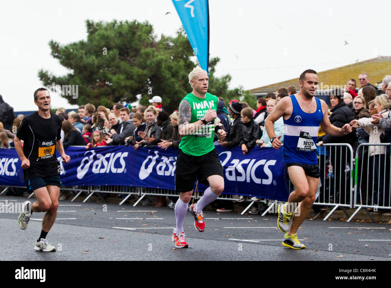 PORTSMOUTH, UK, 30/10/2011. Former 400m runner Iwan Thomas runs for the ...