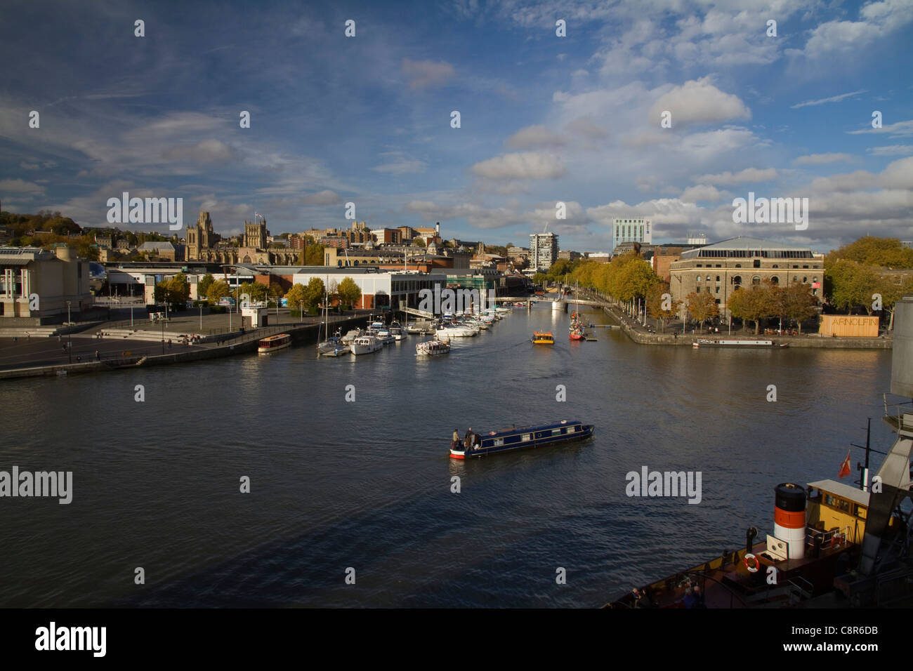 A view of Bristol dock area with the city and cathedral in the ...