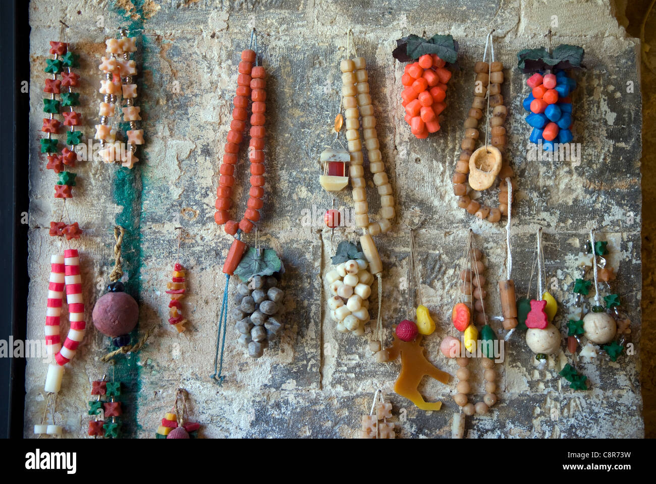 A variety of shapes of soap on display in the souk of Tripoli; a ...