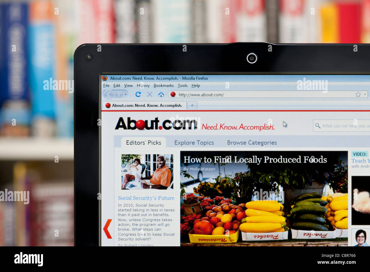 The About.com website shot against a bookcase background (Editorial use ...