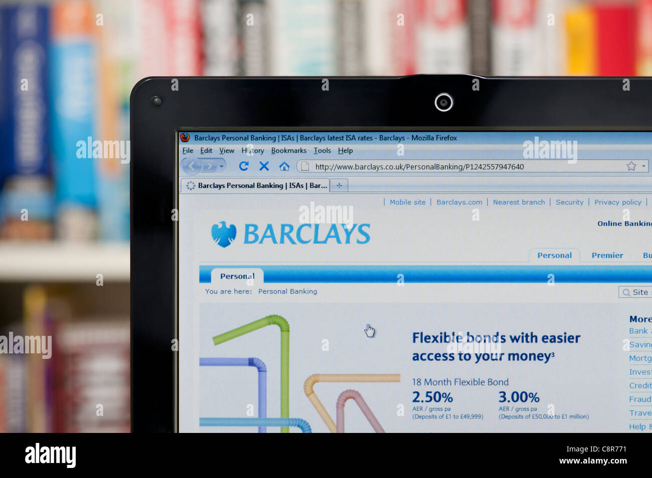The Barclays website shot against a bookcase background (Editorial use ...