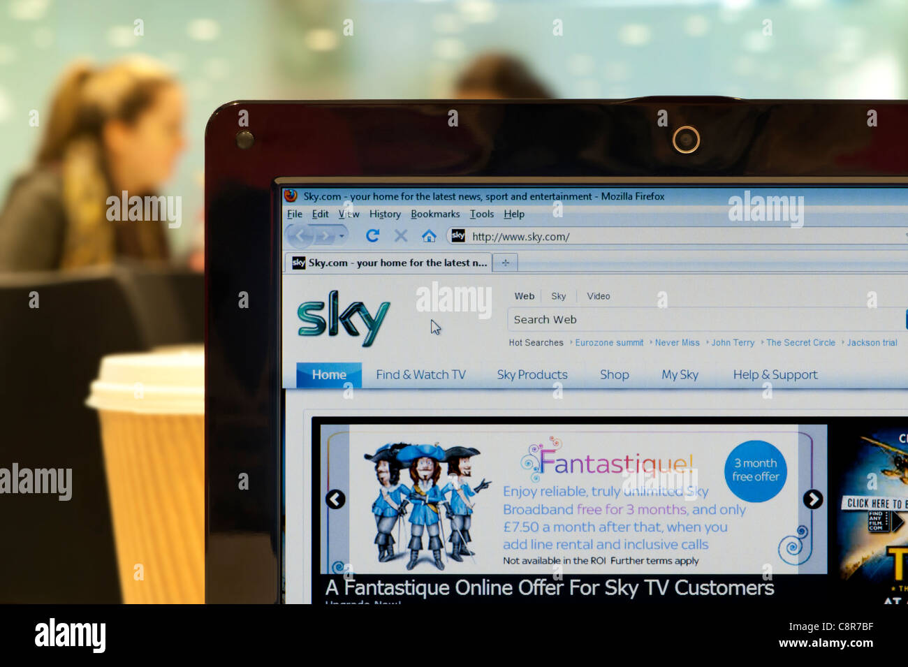 The Sky website shot in a coffee shop environment (Editorial use only ...