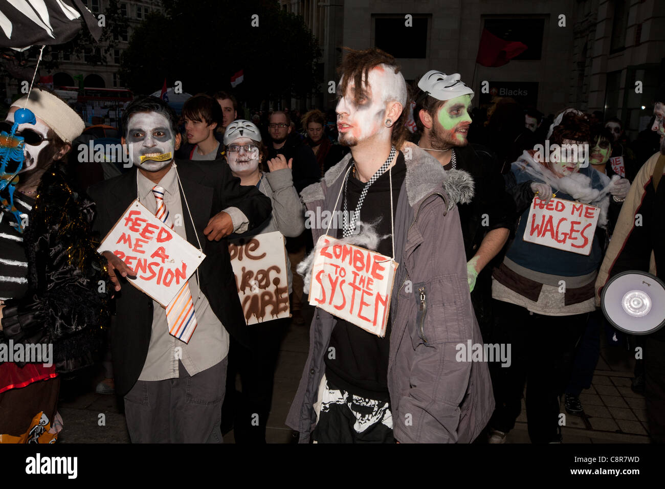 London, UK, 31/10/2011. Activists dressed as zombies heading off to the ...