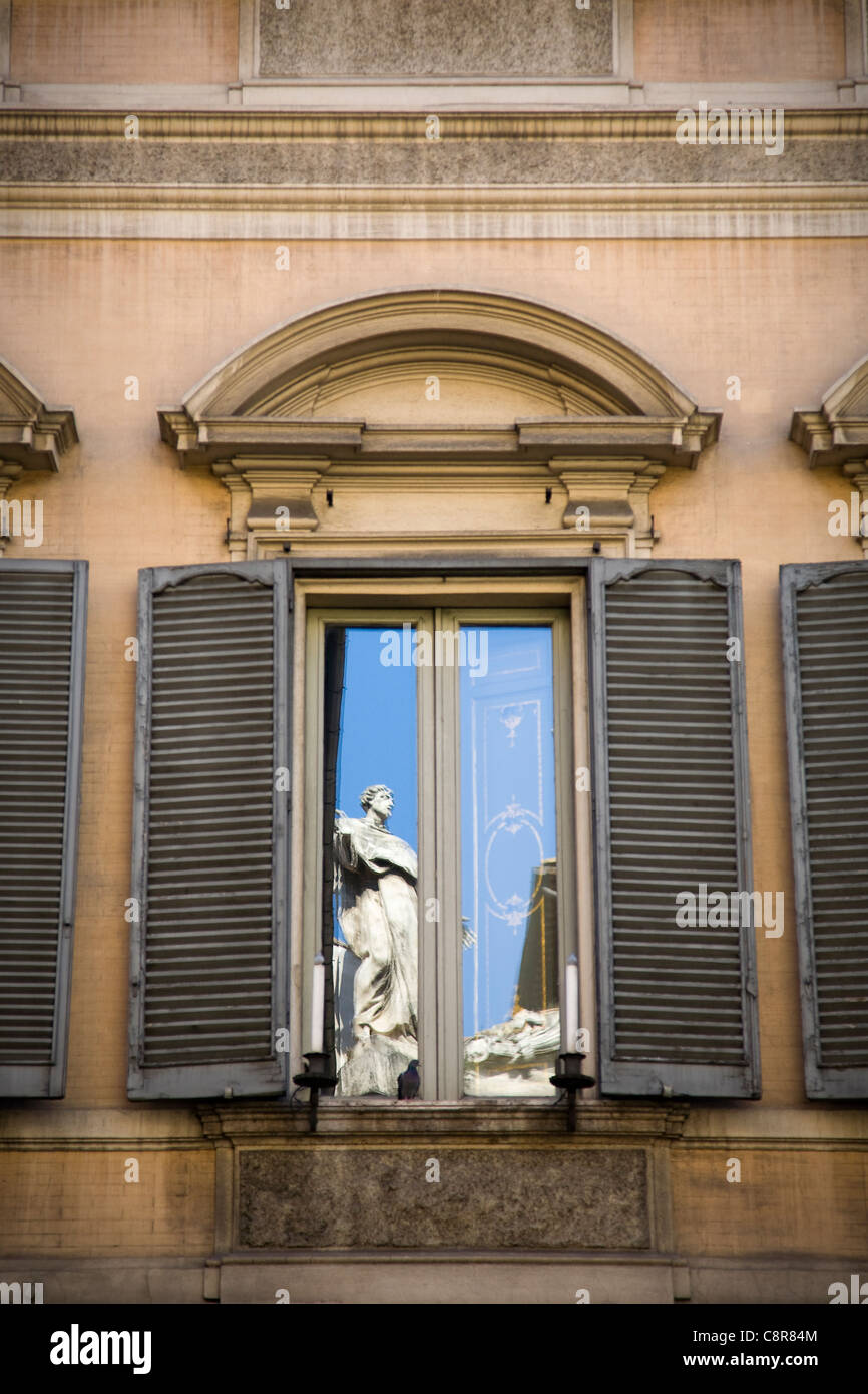 Reflection of a statue in a window, Rome Stock Photo - Alamy