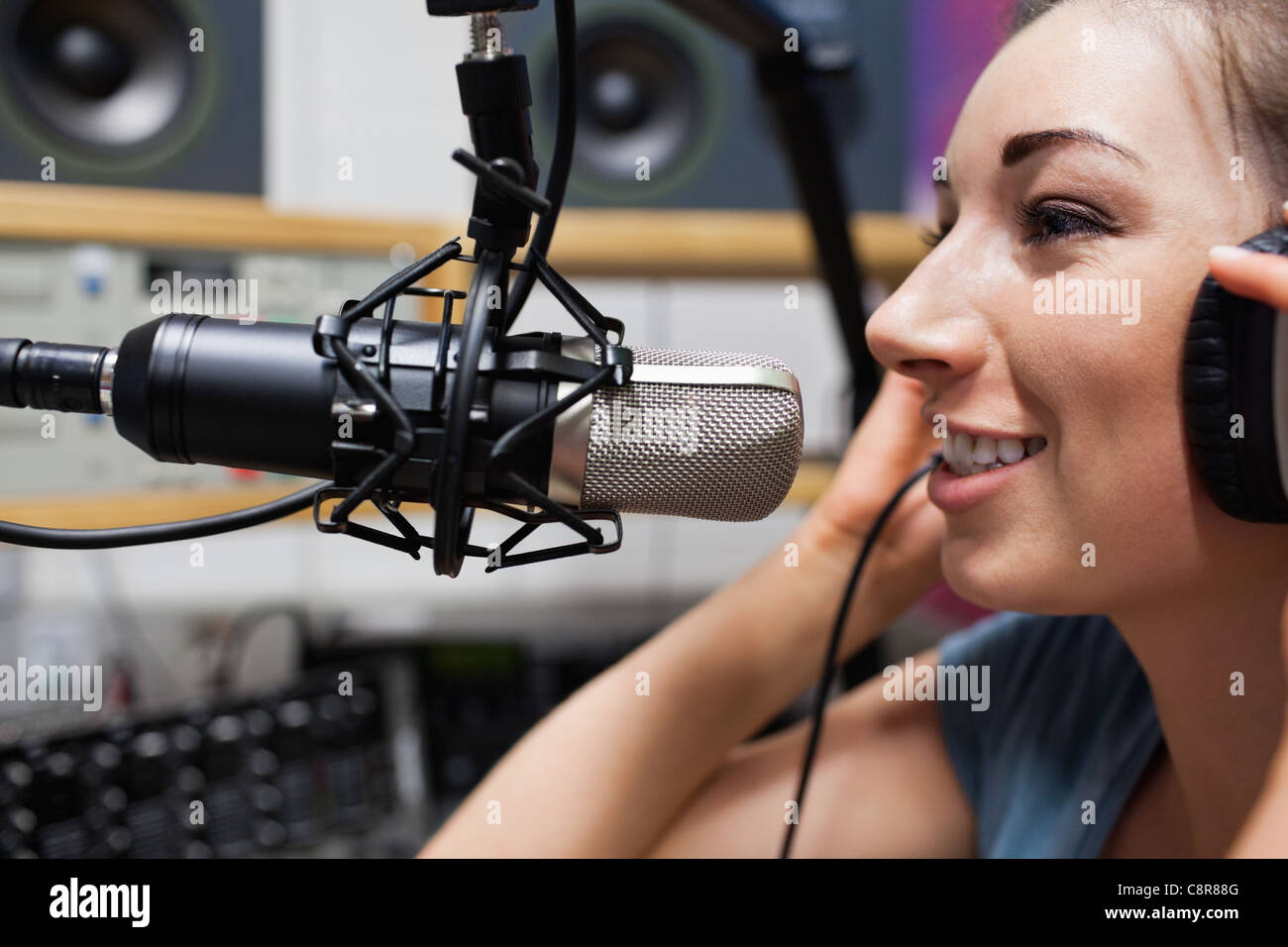 Close up of a young radio host speaking Stock Photo - Alamy