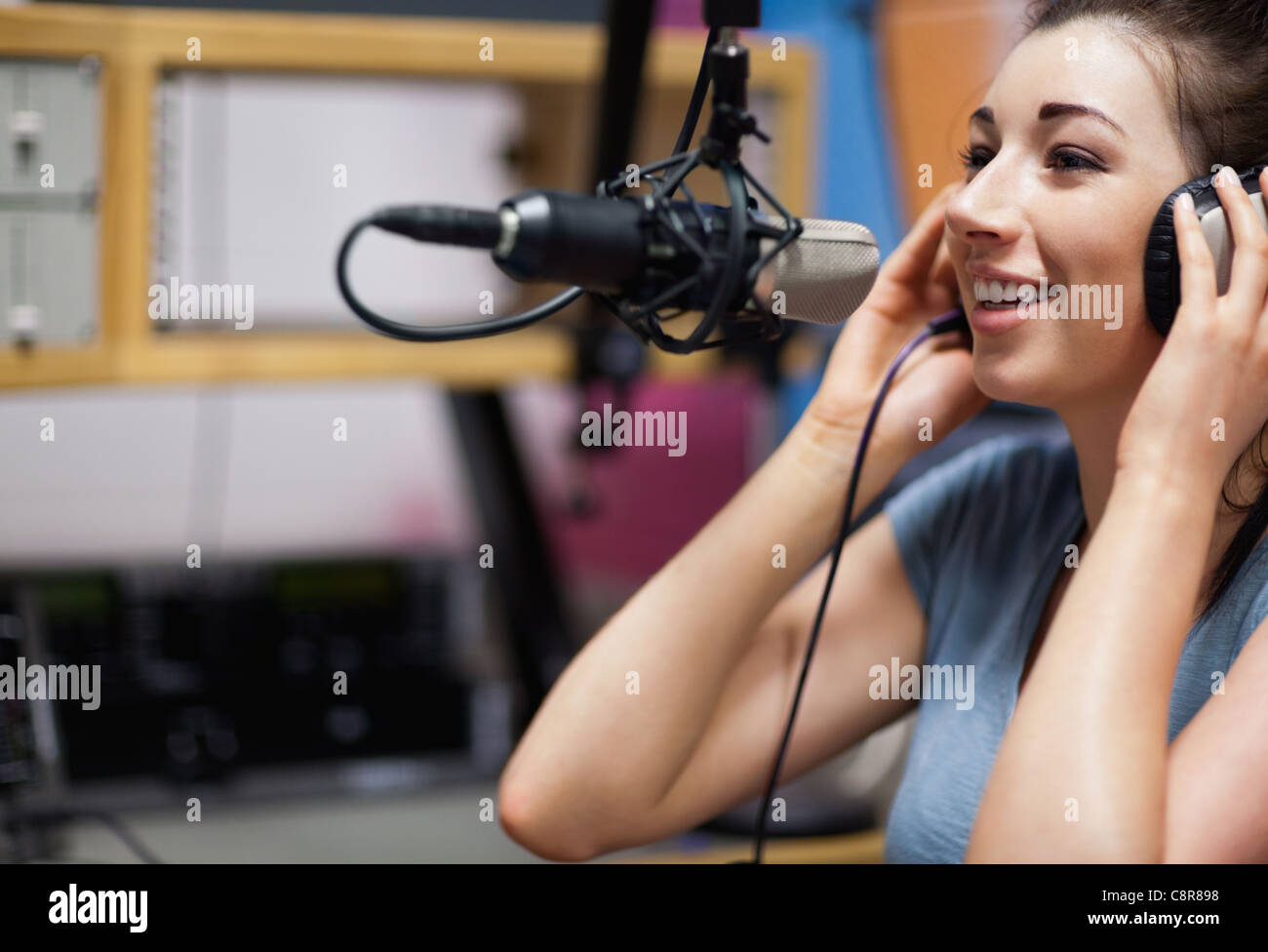 Cute radio host speaking Stock Photo - Alamy