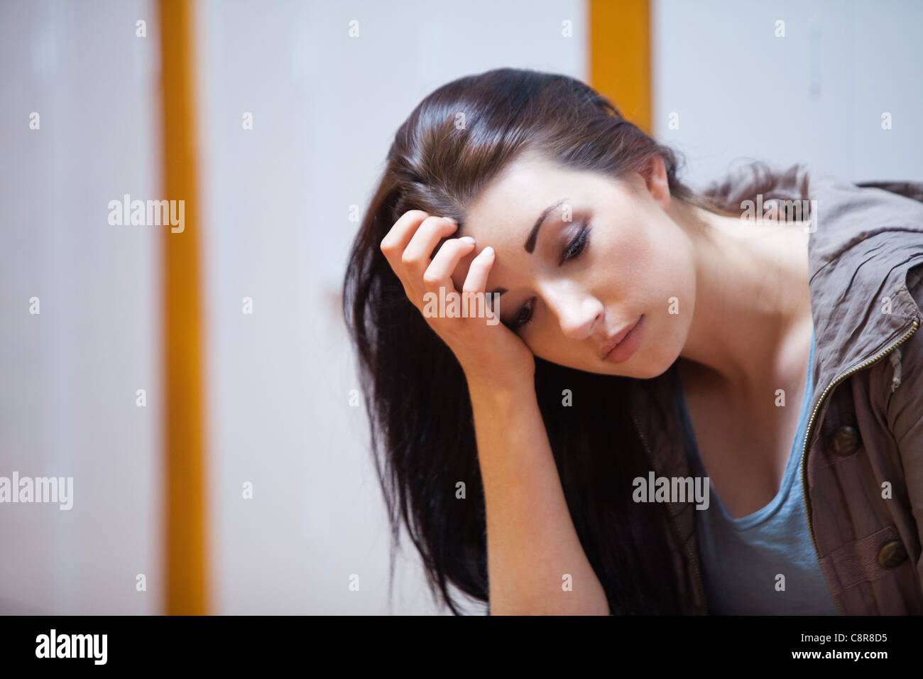 Lonely student with her head on her hand Stock Photo - Alamy