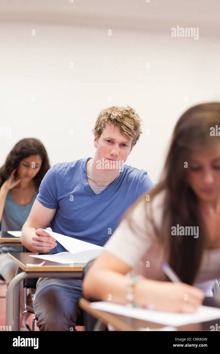 Portrait of young students having a test Stock Photo - Alamy