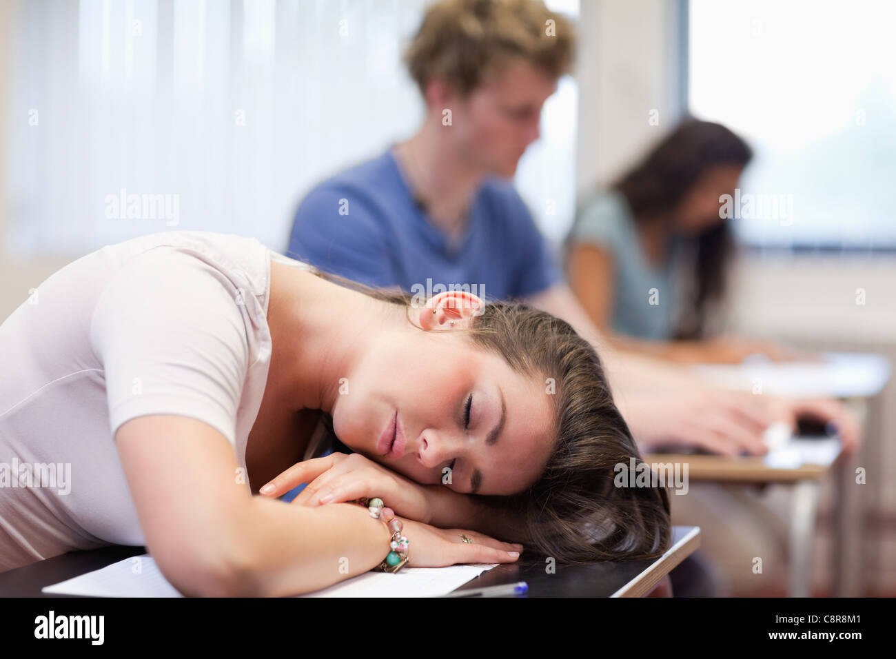 Sleepy College Female Student Classroom High Resolution Stock ...