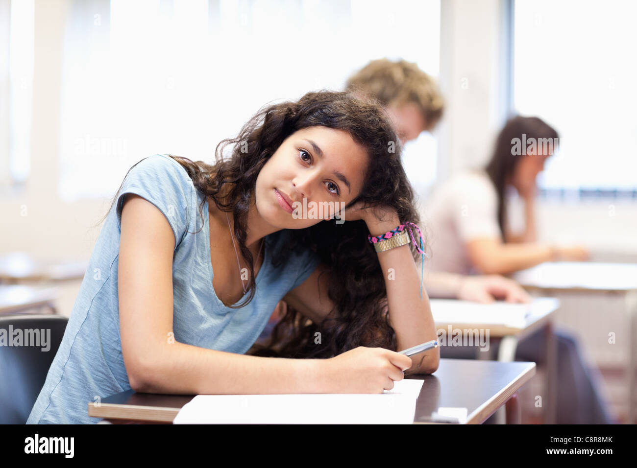 Calm young student posing Stock Photo - Alamy