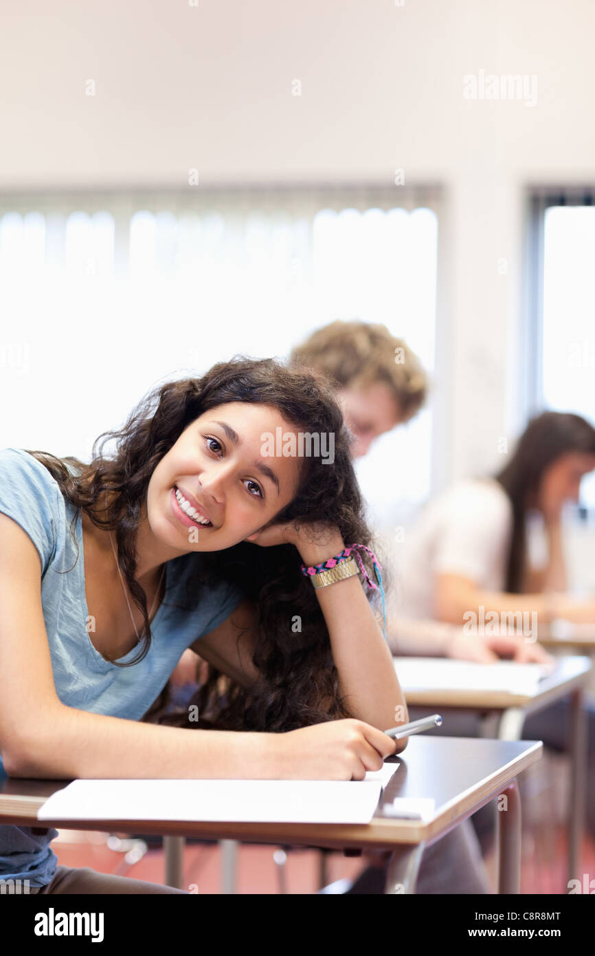 Portrait of a smiling young student posing Stock Photo - Alamy