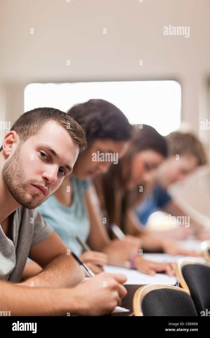 Portrait of students taking an exam Stock Photo - Alamy