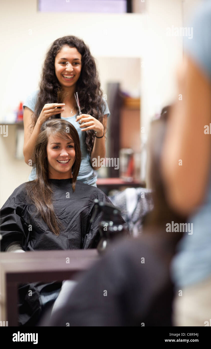 Young female barber making hi-res stock photography and images - Alamy