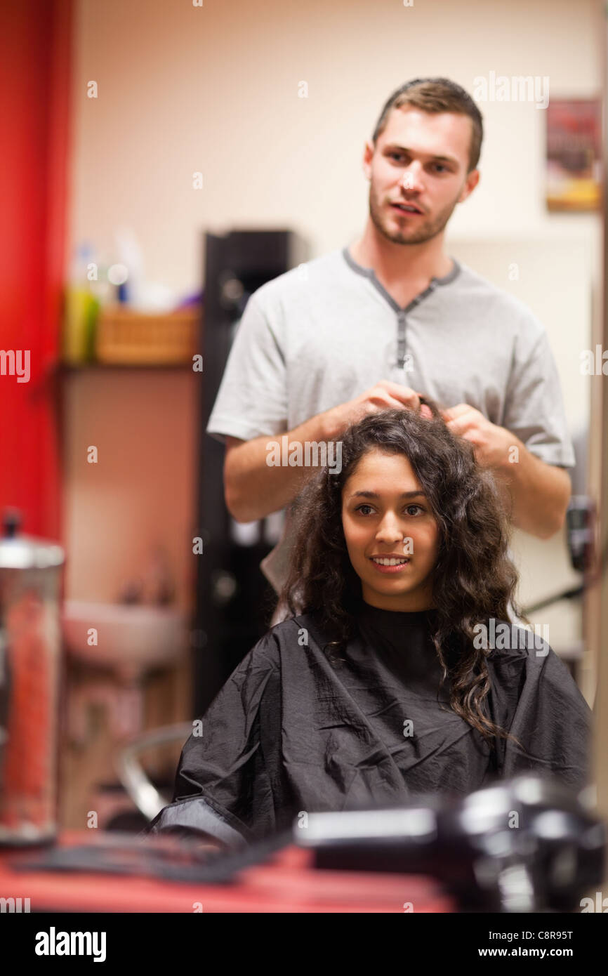 Portrait of a hairdresser talking Stock Photo - Alamy
