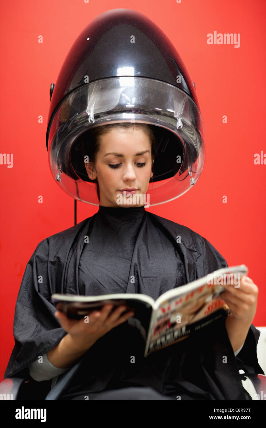 Portrait student under hairdressing machine hi-res stock photography ...