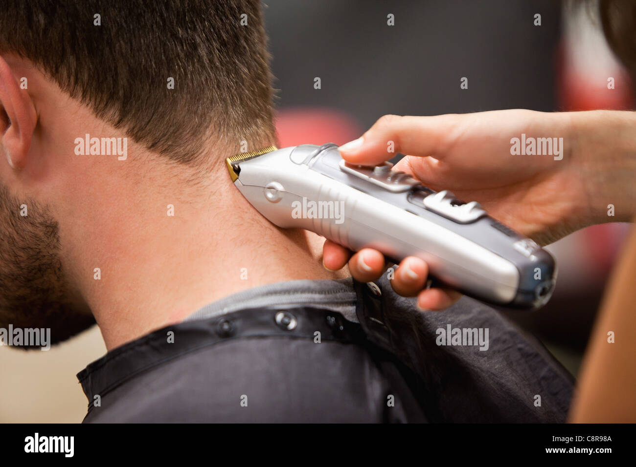 Man having a haircut Stock Photo - Alamy