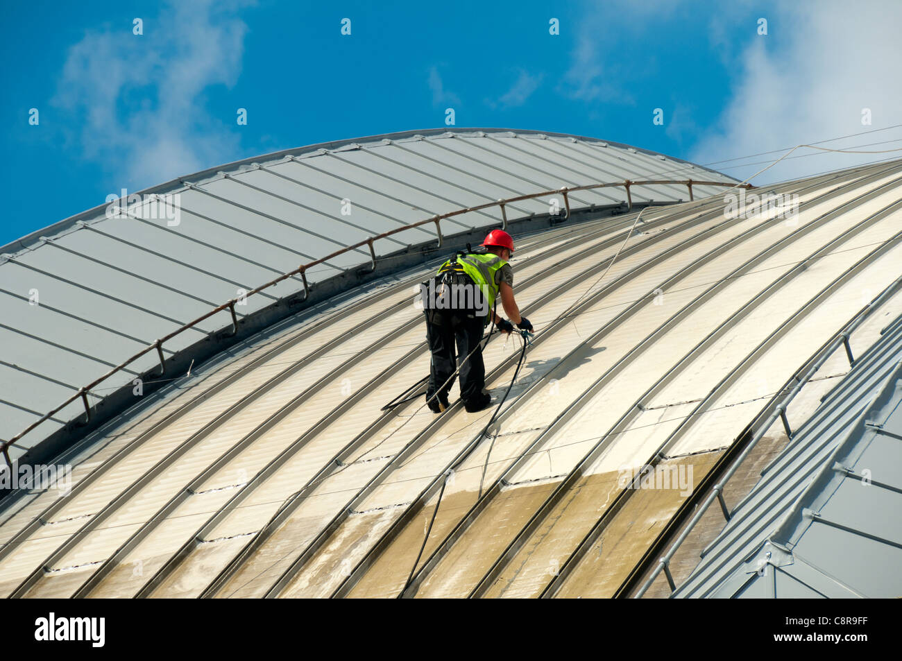 Workman on the roof of the Manchester Central (GMEX) building ...