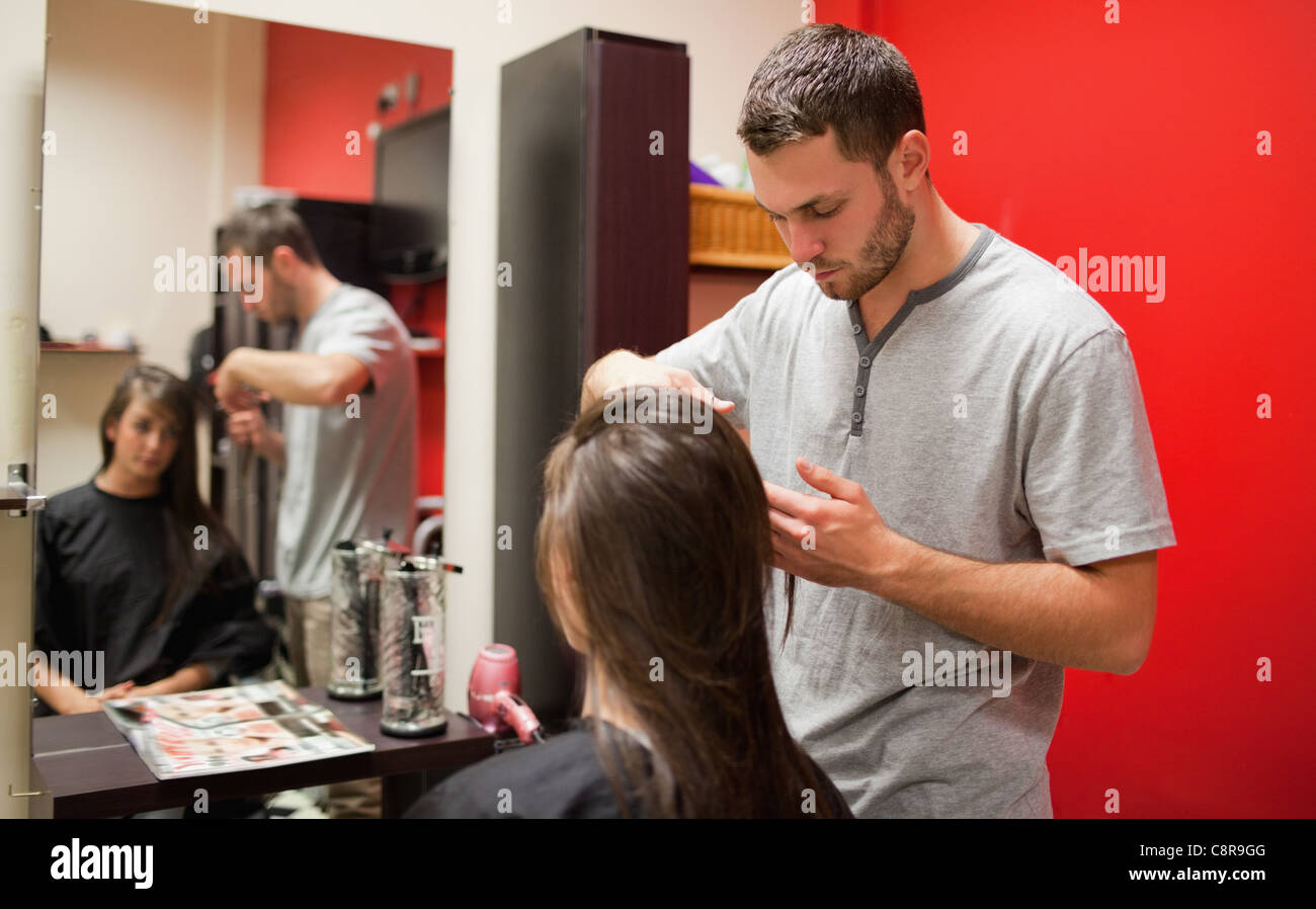 Hairdresser male cutting hair scissors hi-res stock photography and ...