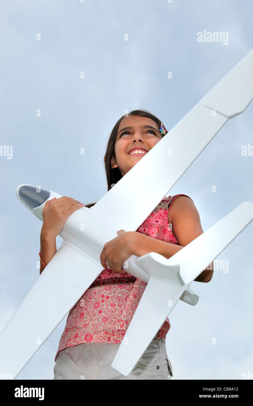 Girl with model plane Stock Photo - Alamy