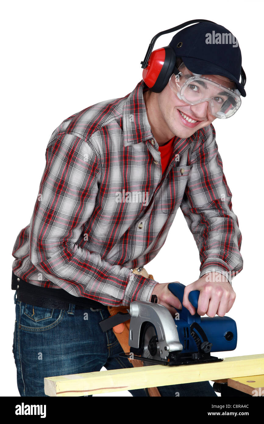 Man using a circular saw Stock Photo - Alamy