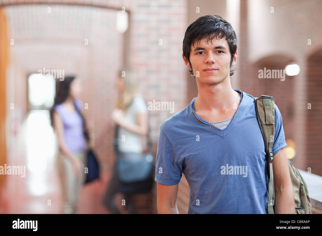 Male student posing Stock Photo - Alamy