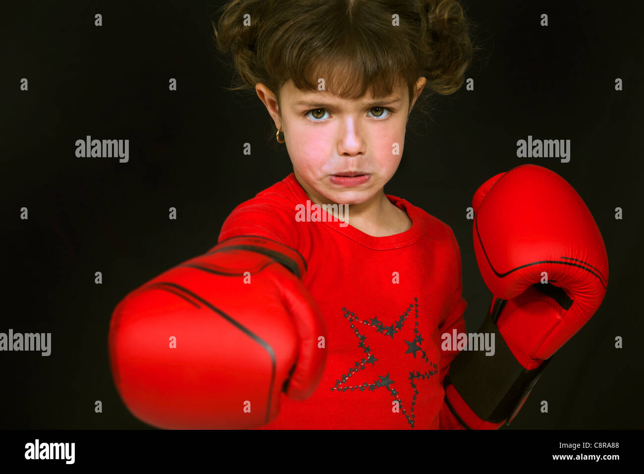 Little girl boxing Stock Photo - Alamy
