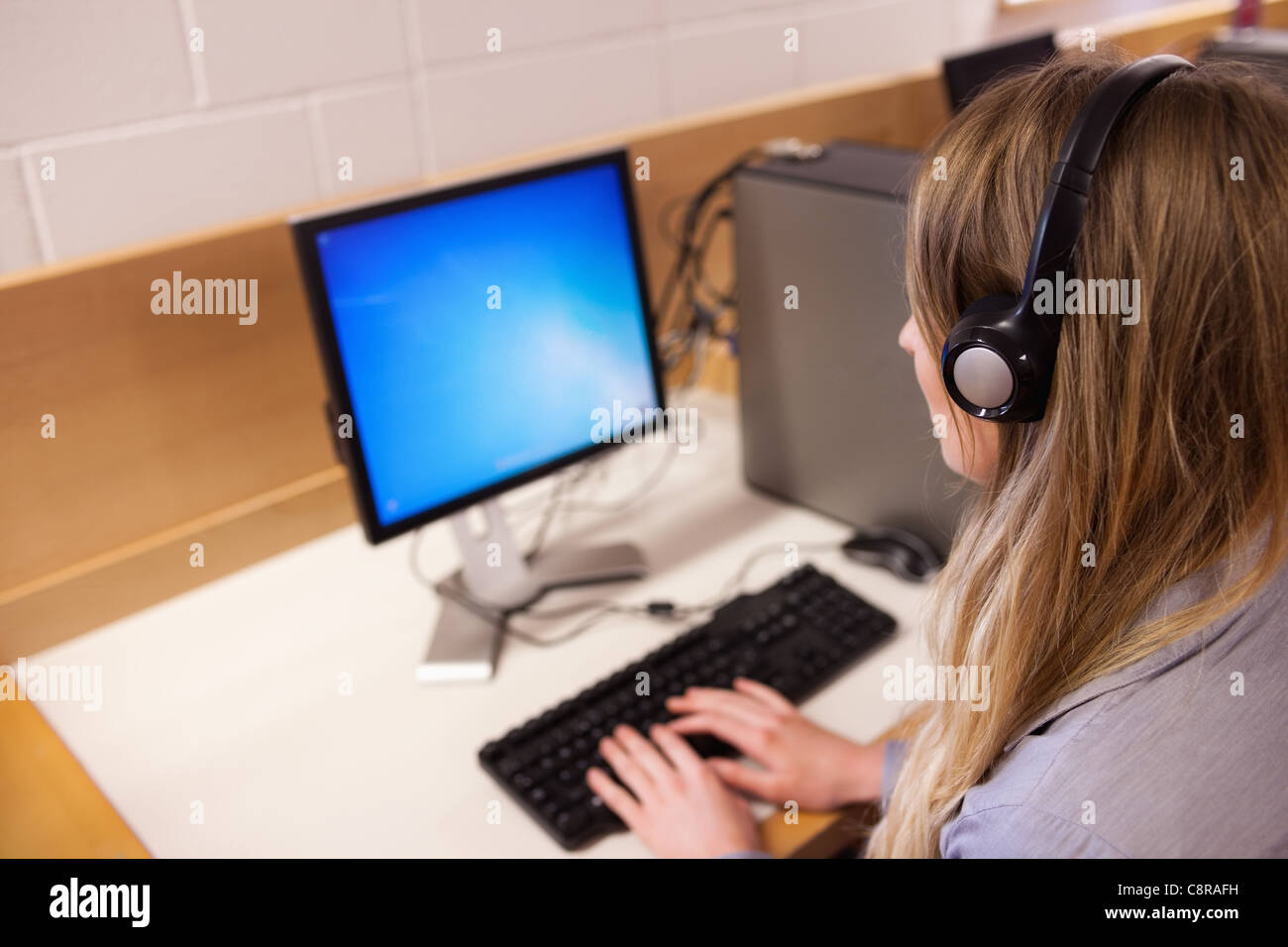 Blonde operator using a computer Stock Photo - Alamy
