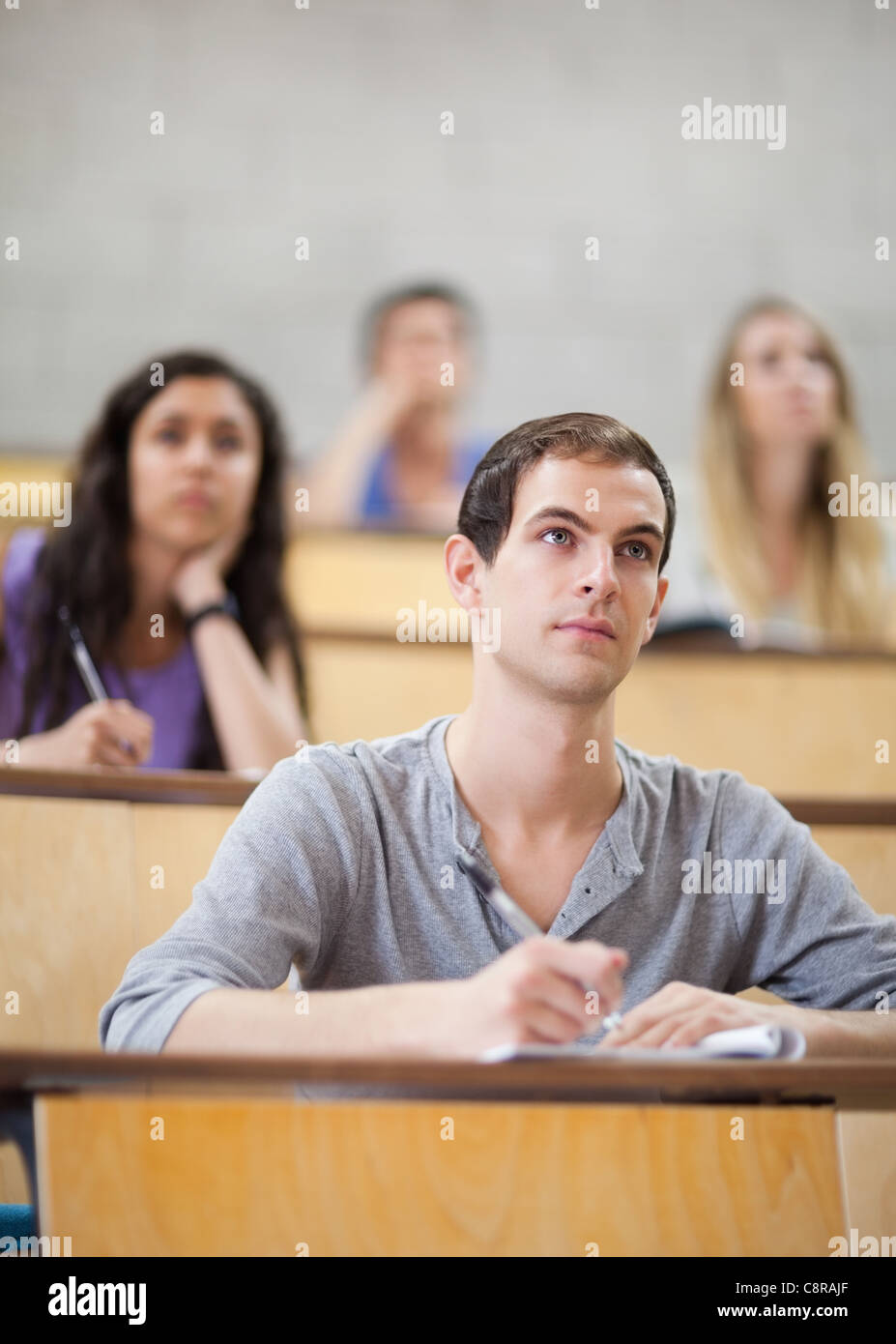 Serious students listening during a lecture Stock Photo - Alamy Serious students listening during a lecture Stock Photo - Alamy