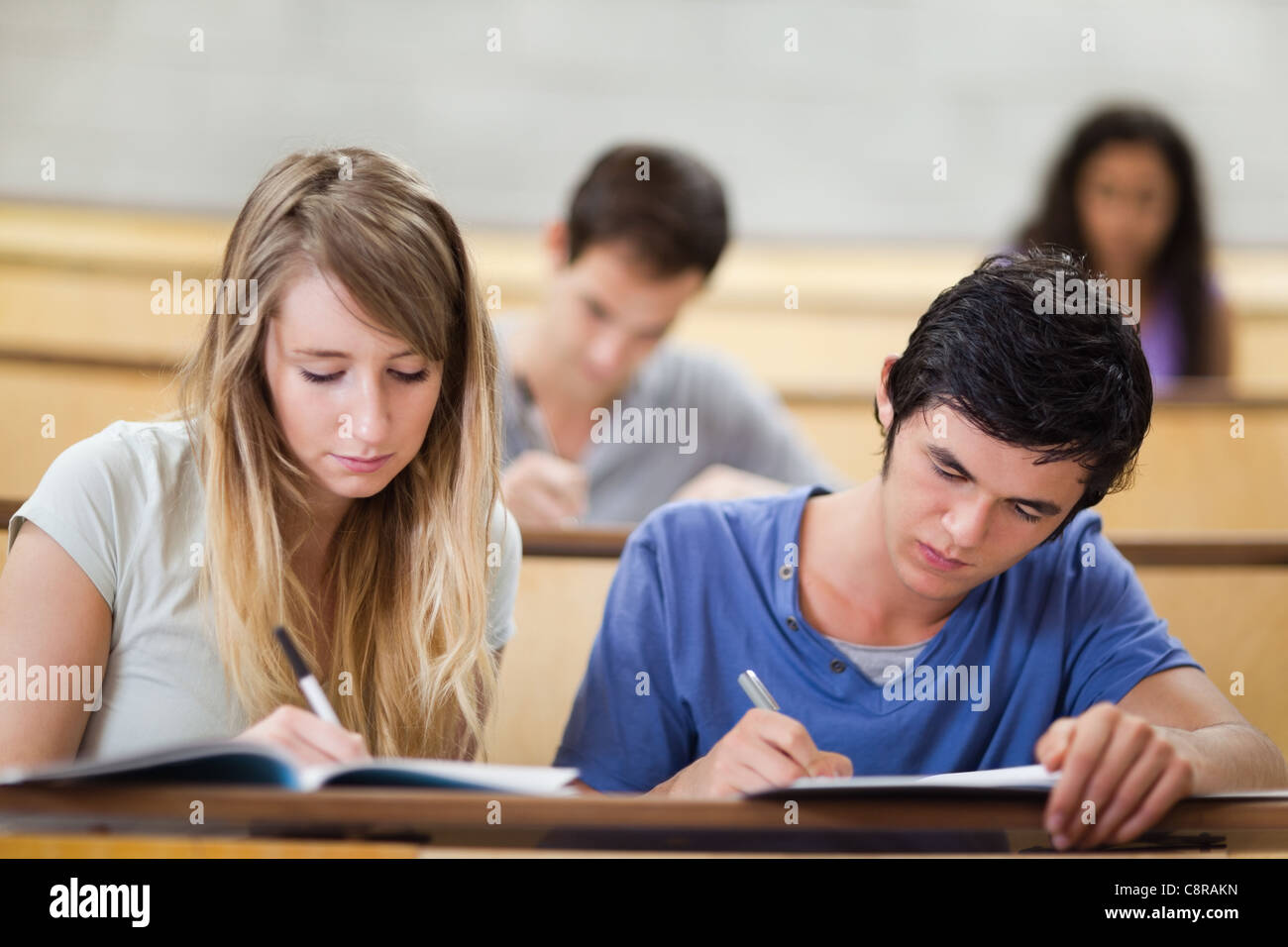 Students taking notes Stock Photo - Alamy