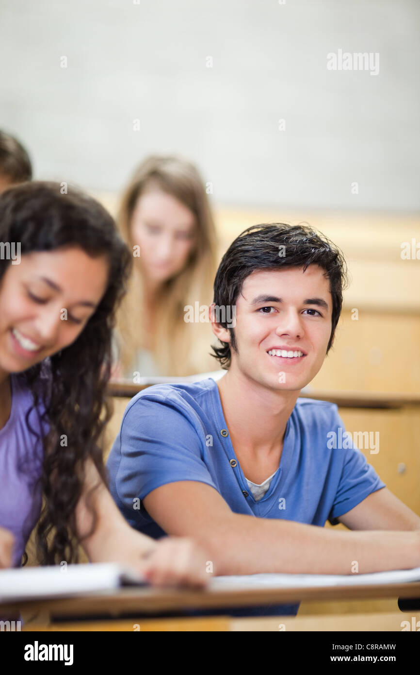 Portrait of a handsome student taking notes Stock Photo - Alamy
