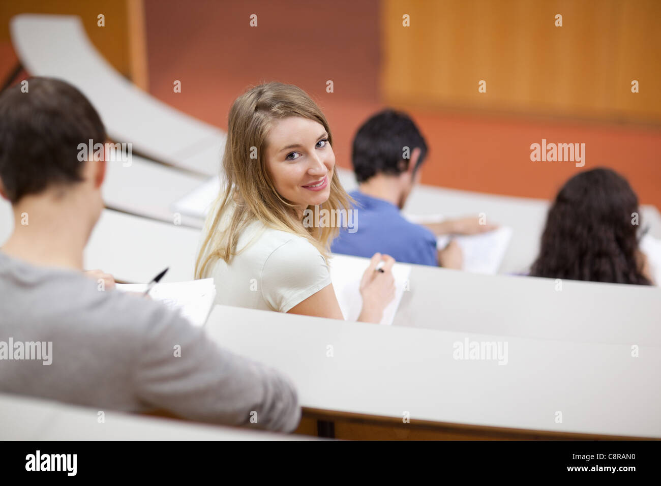 Young student being distracted Stock Photo - Alamy