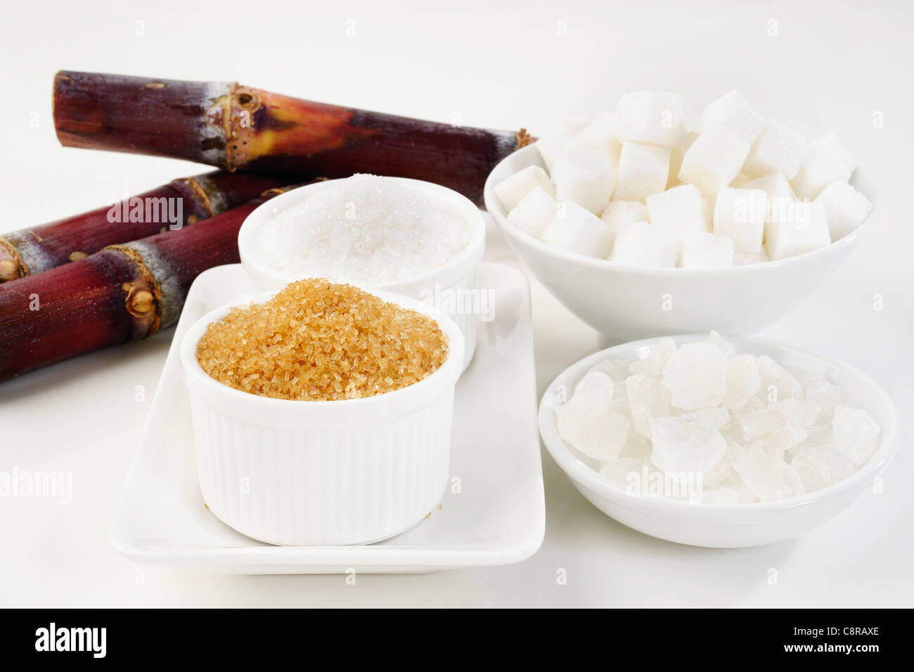 Various kinds of sugar on white Stock Photo - Alamy
