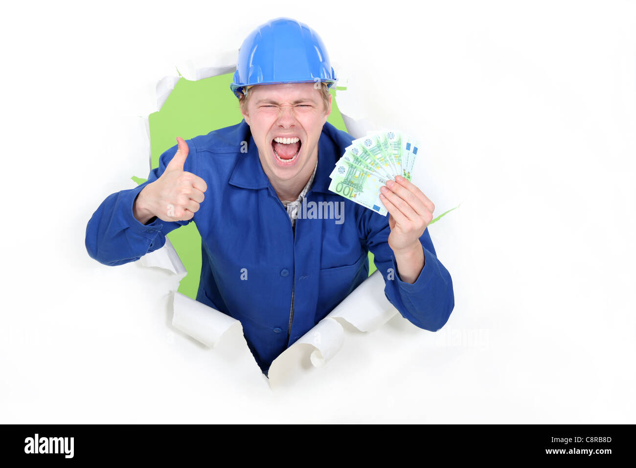 A male construction worker with plenty of cash Stock Photo - Alamy