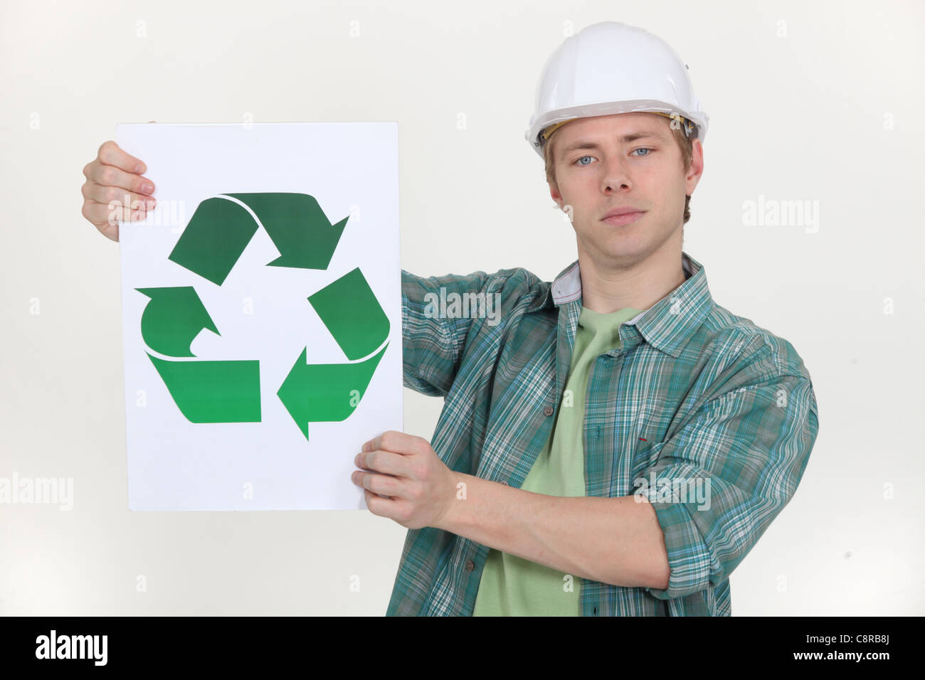 A construction worker promoting recycling Stock Photo - Alamy