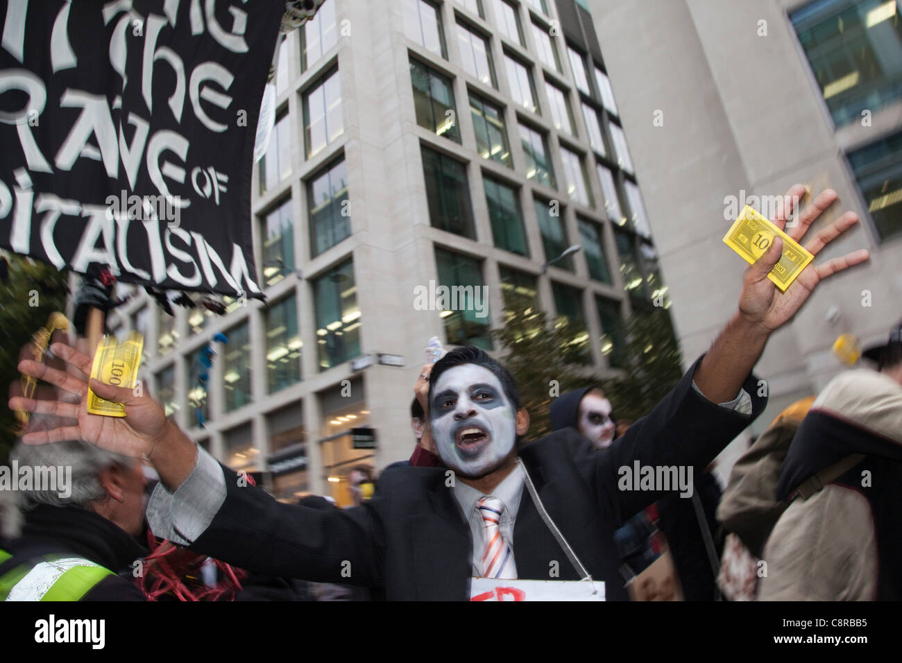 31 October 2011, London, UK. Around 50 Zombies dressed as "Bankers ...
