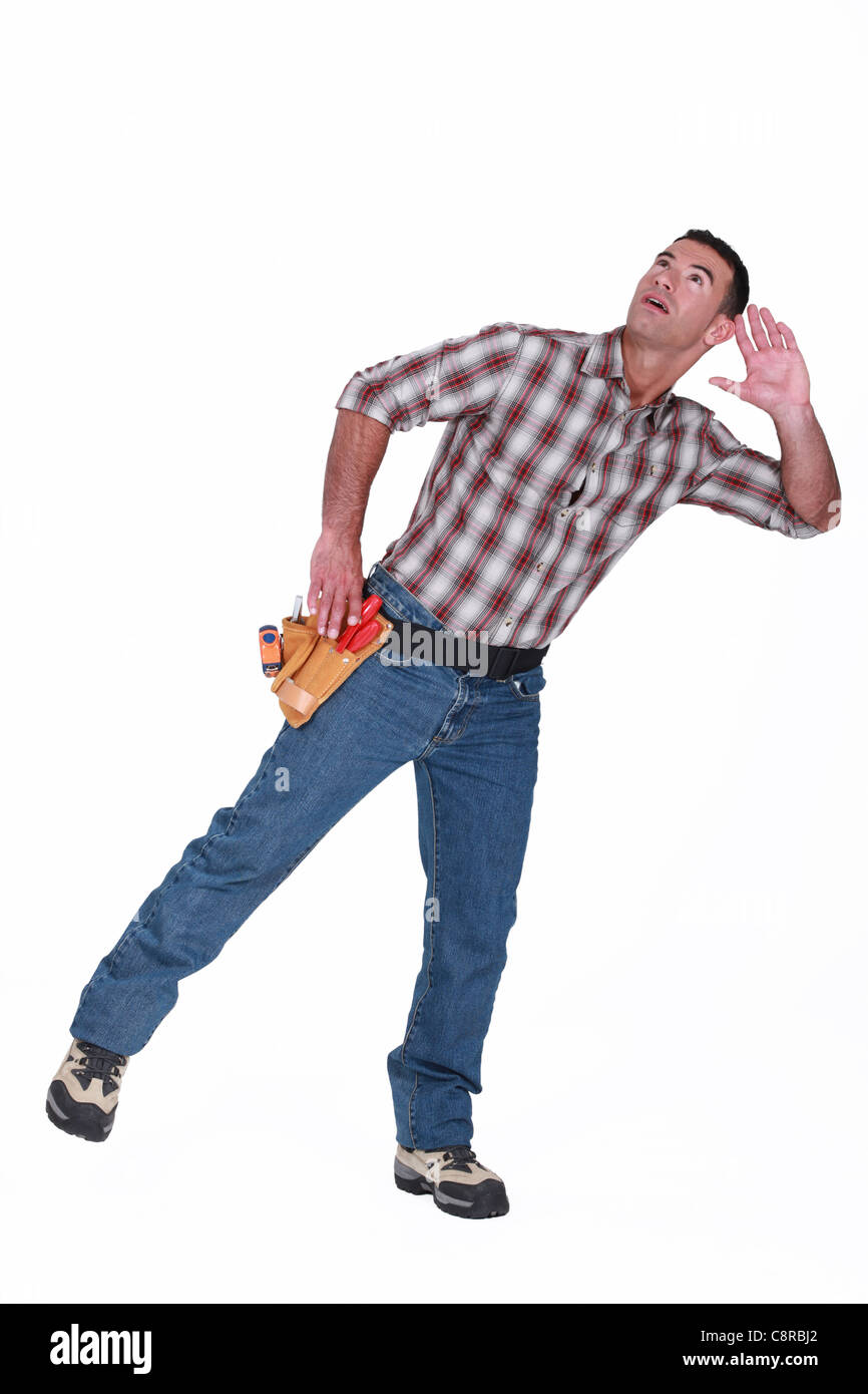 craftsman straining his ears Stock Photo - Alamy