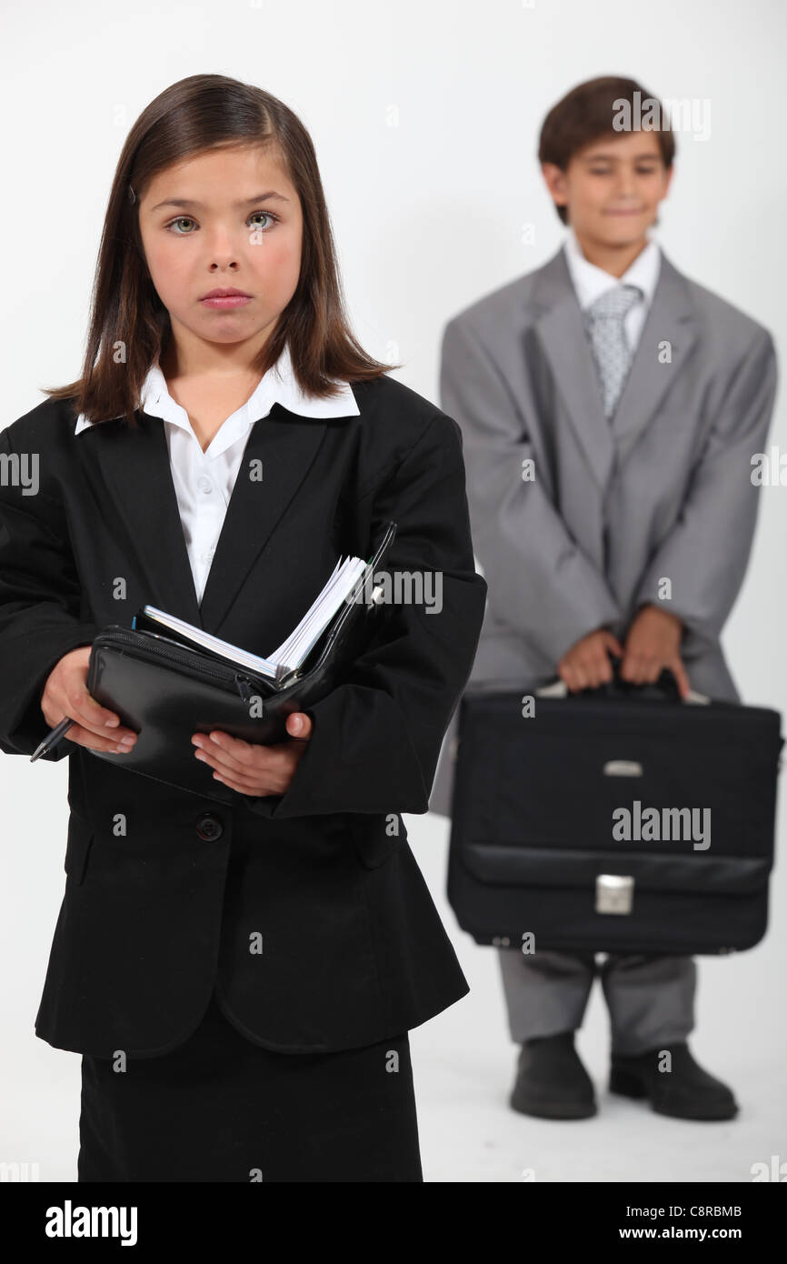 Kids dressed as businesspeople Stock Photo - Alamy