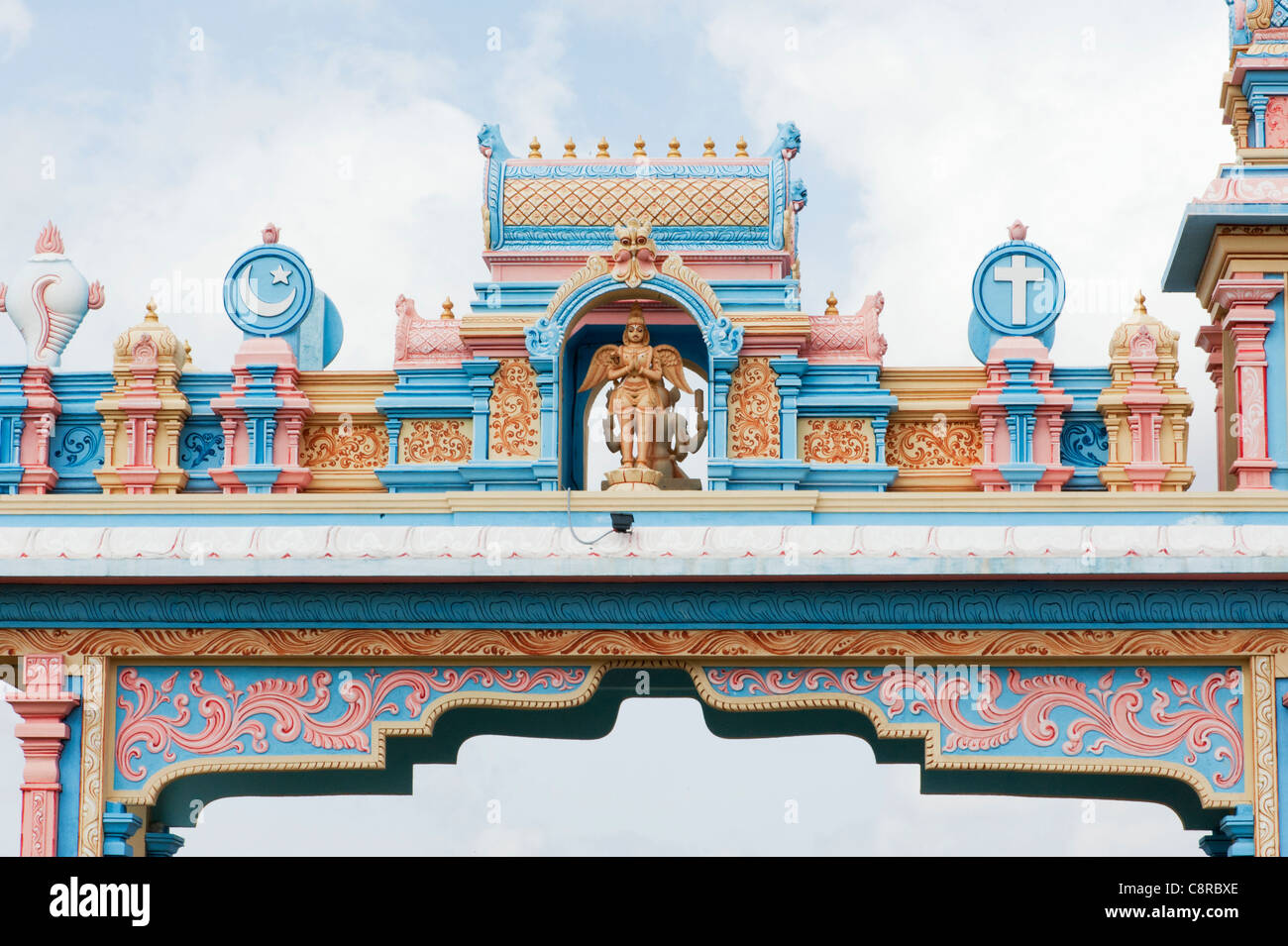 Garuda. Hindu deity painted archway against blue sky. Puttaparthi ...