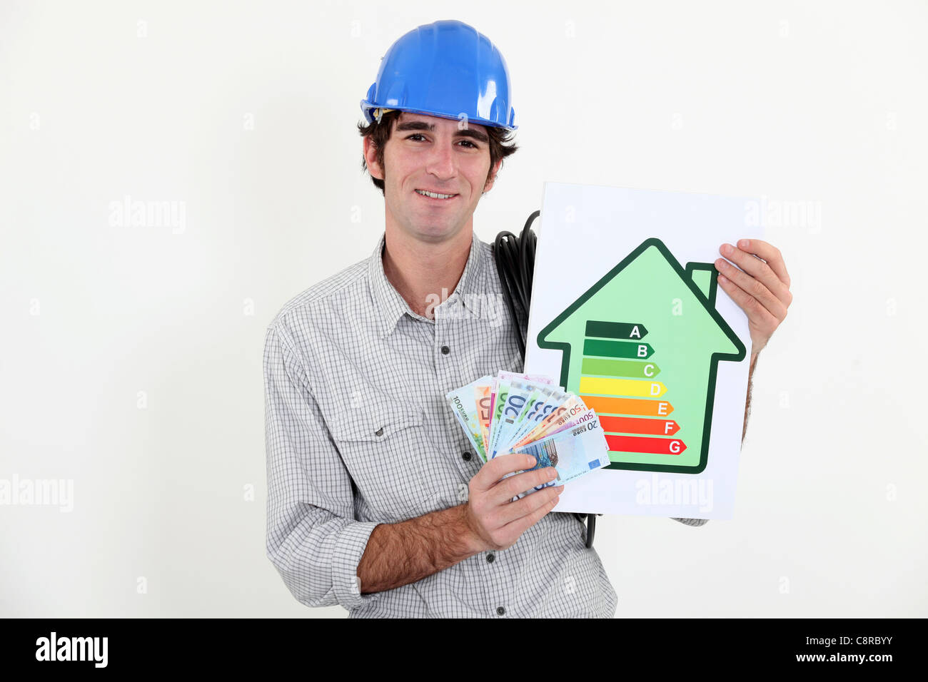 Electrician with cash and a ratings symbol Stock Photo - Alamy