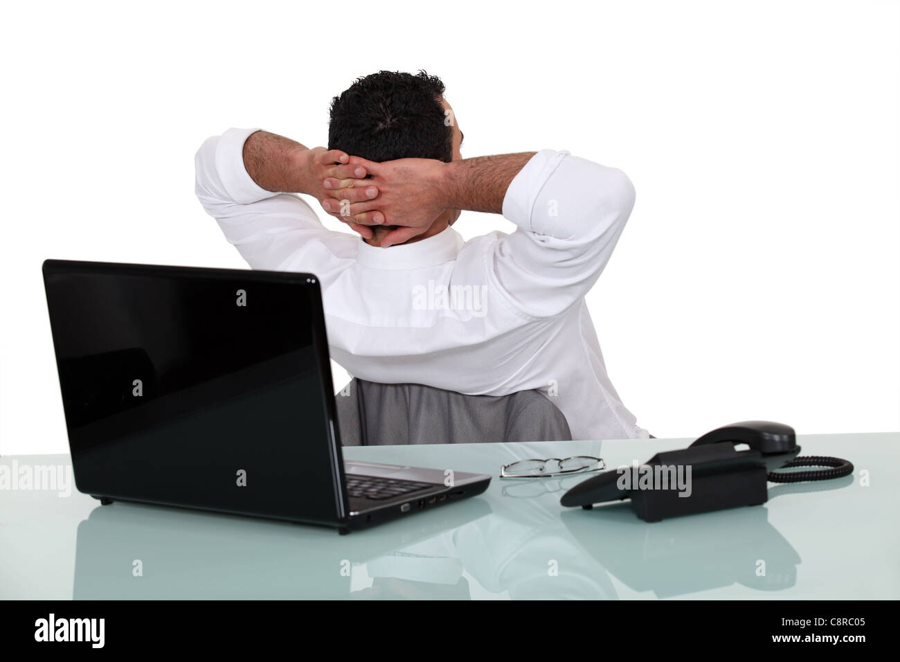 Office worker relaxing in chair Stock Photo - Alamy