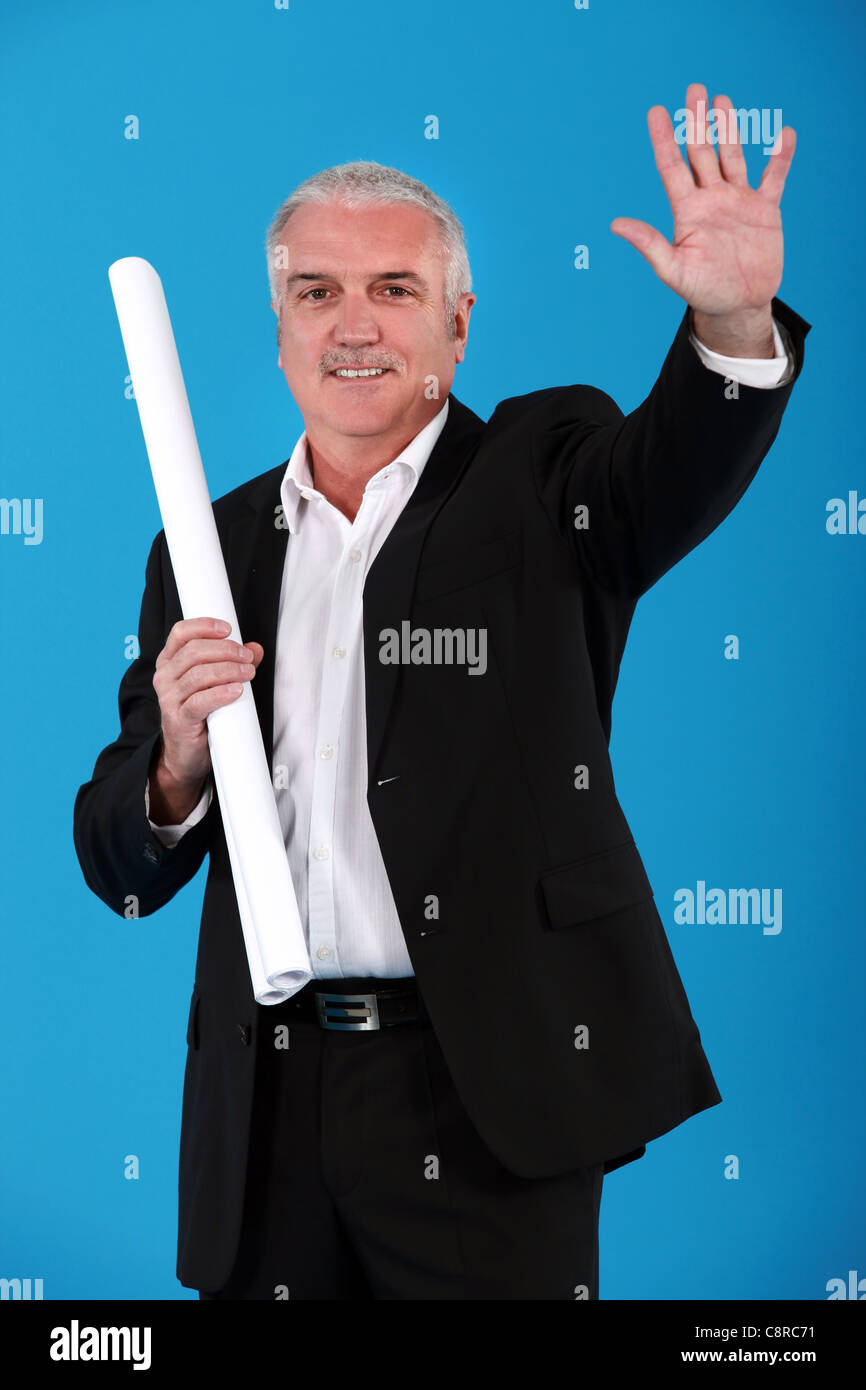 Engineer waving his hand Stock Photo - Alamy