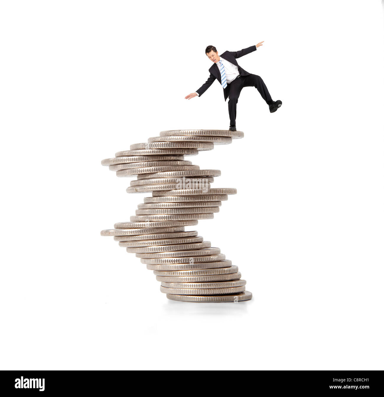 financial and crisis concept. businessman standing on the unstable ...