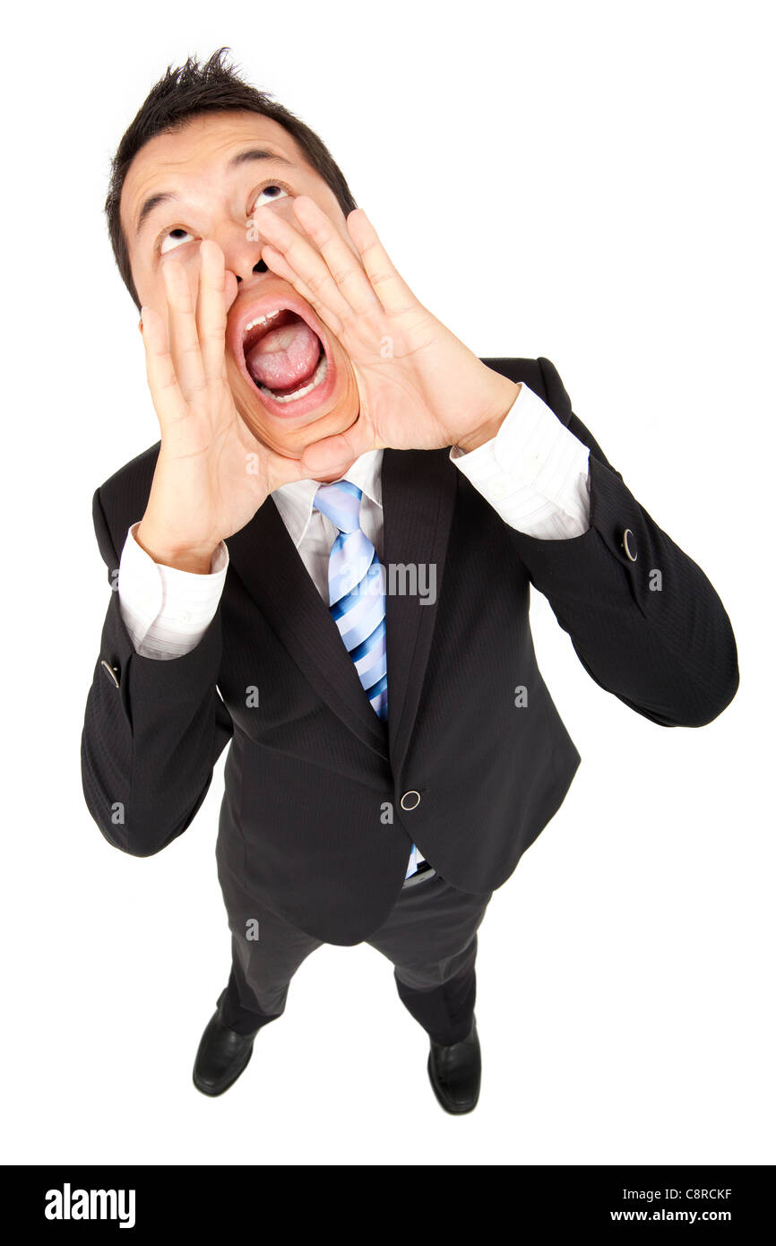 businessman looking above and shouting Stock Photo - Alamy
