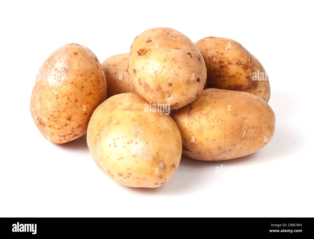 Yellow potato group isolated on white background Stock Photo - Alamy