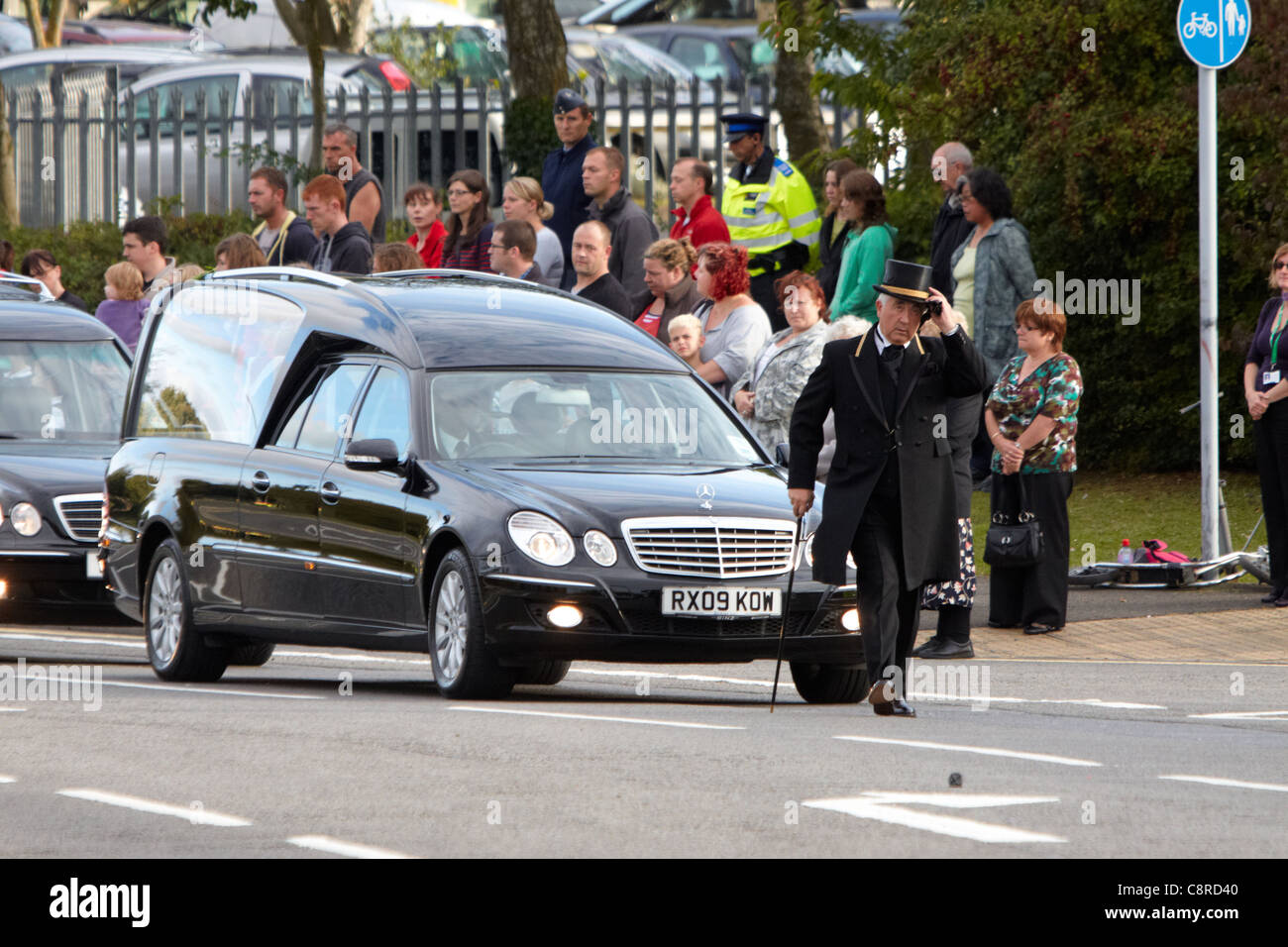 The cortege arrives at the repatriation memorial in Carterton ...