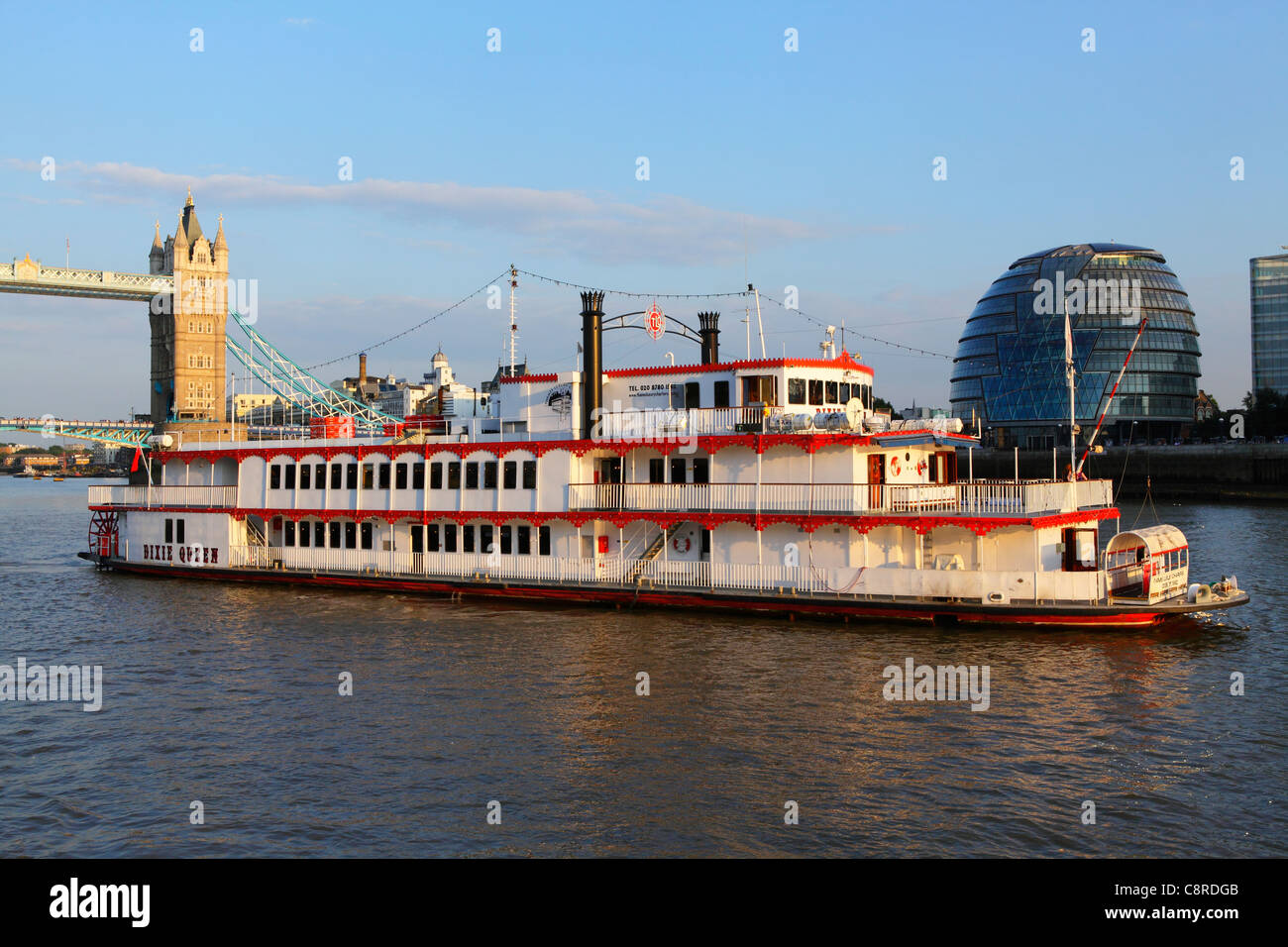 London River Thames paddle steamer, Tower Bridge and City Hall Stock ...