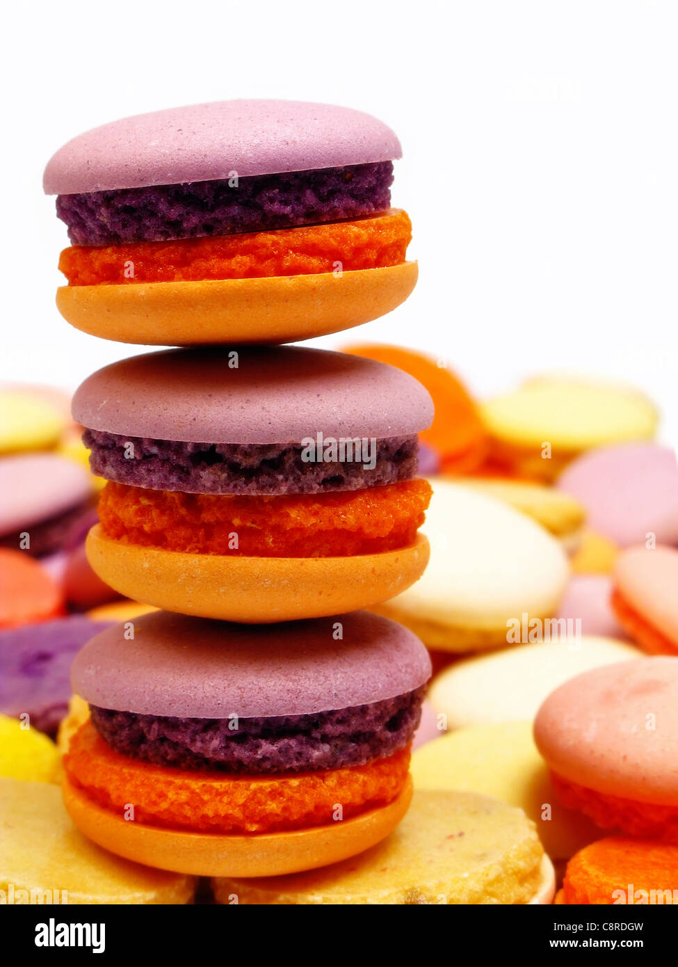 stack of orange and blackcurrant macaroons Stock Photo - Alamy