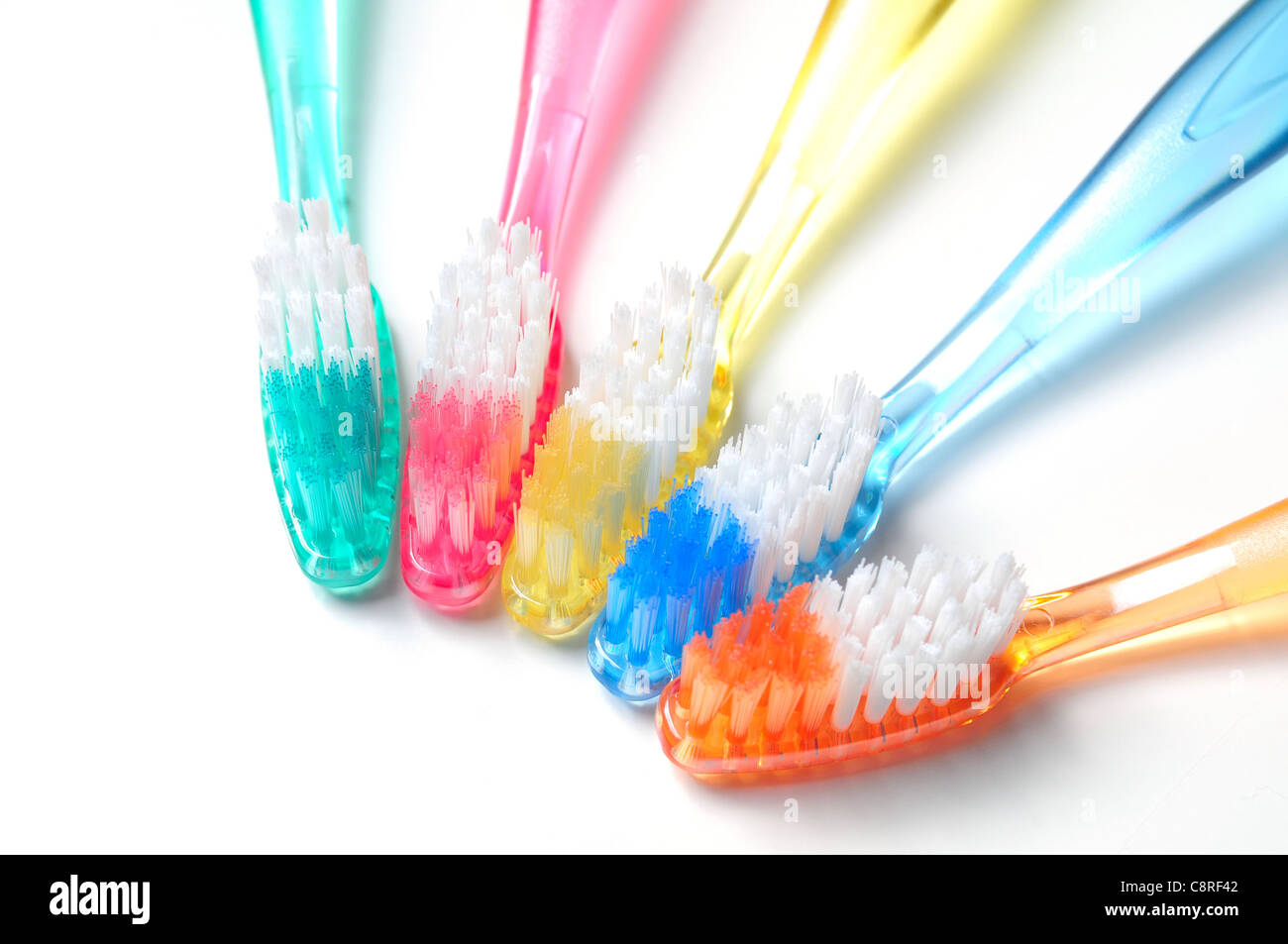 Group of multicolored toothbrushes over white background Stock Photo ...